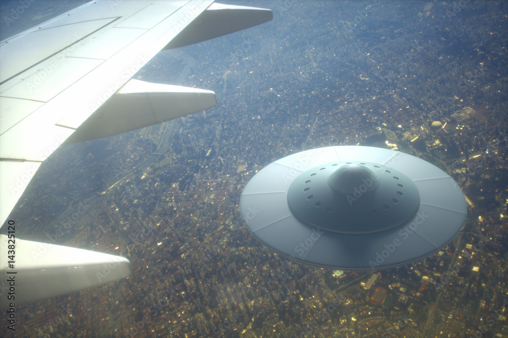 UFO - Unidentified Flying Object. Alien spaceship flying together with ...