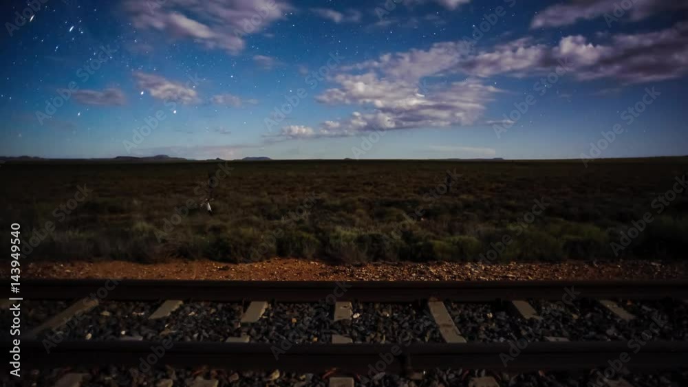 Linear timelapse at night time with a dramatic moonlit landscape scene ...