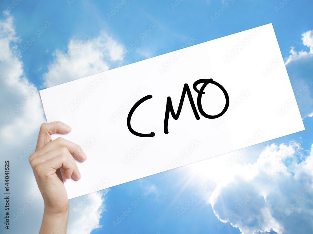 CMO (Chief Marketing Officer) Sign on white paper. Man Hand Holding ...