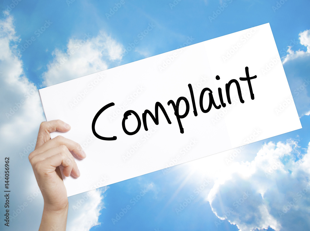 Complaint Sign on white paper. Man Hand Holding Paper with text ...