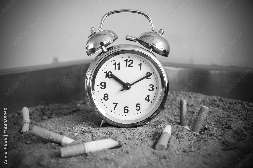 Cigarette And Alarm Clock
