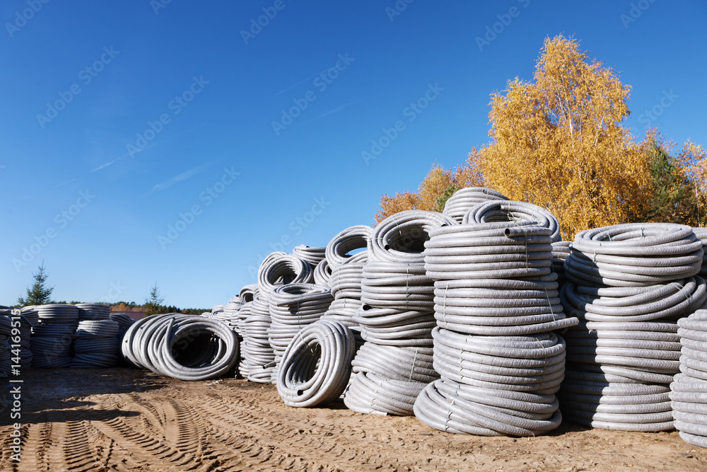 Stack of coiled plastic pvc Polyethylene Corrugated drainage pipes for ...