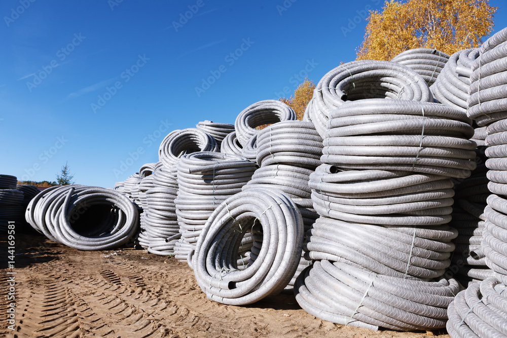 Stack of coiled plastic pvc Polyethylene Corrugated drainage pipes for ...