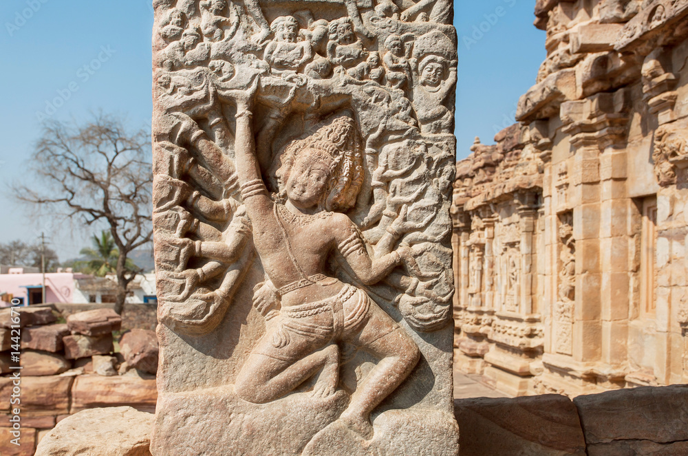 Fotka „Many hands of indian Lord Brahma creating the world on stone ...