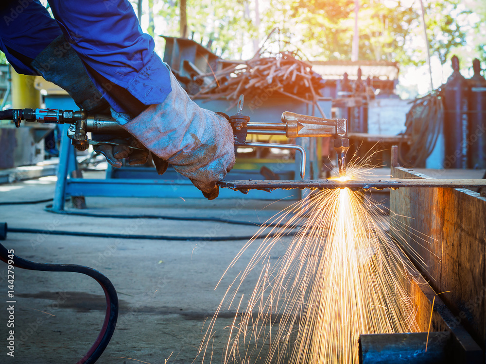 Worker cutting steel with acetylene welding cutting torch. Stock Photo ...