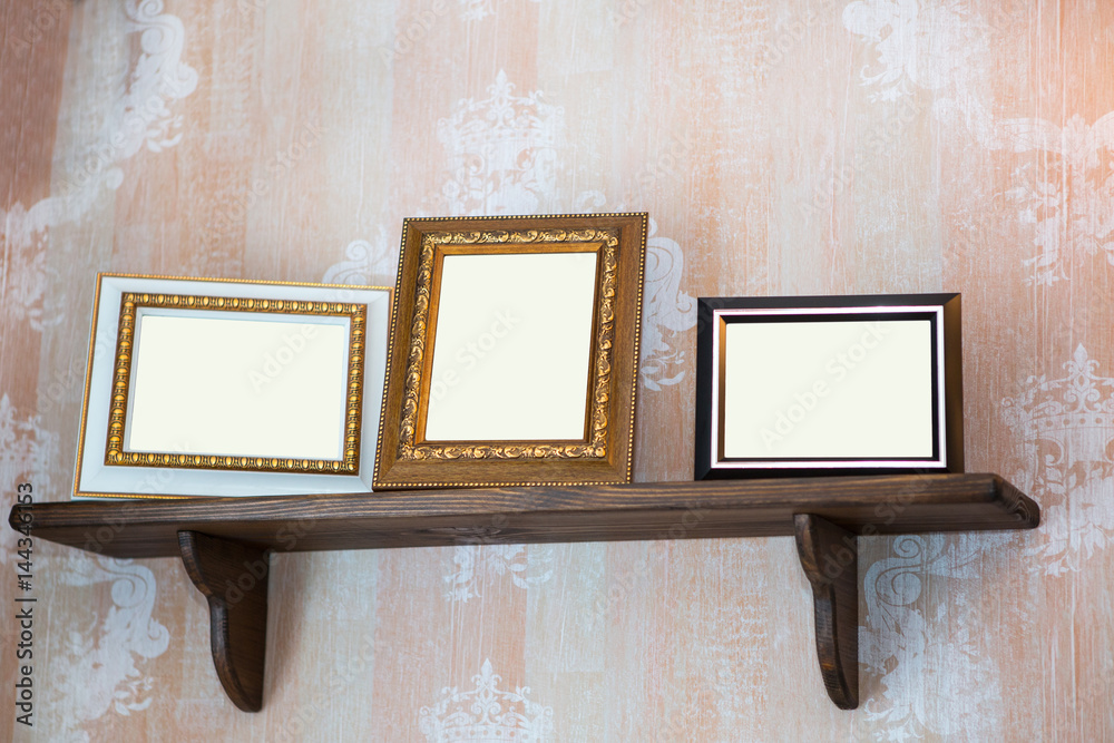 Photos on a shelf in a frame. Pictures on a shelf in a frame. Stock ...