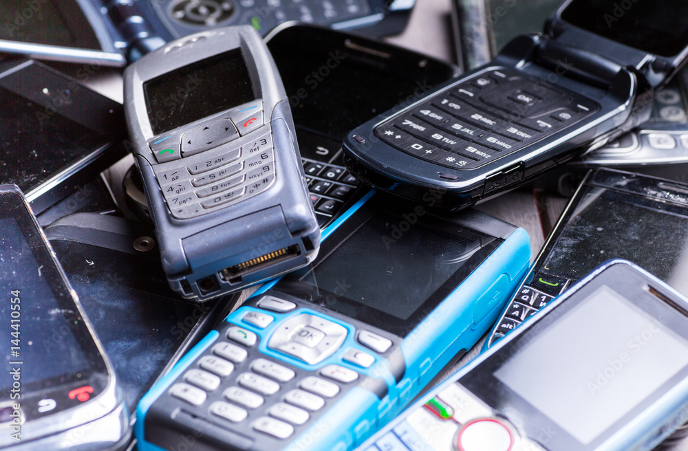 Old phones - electronic waste Stock Photo | Adobe Stock