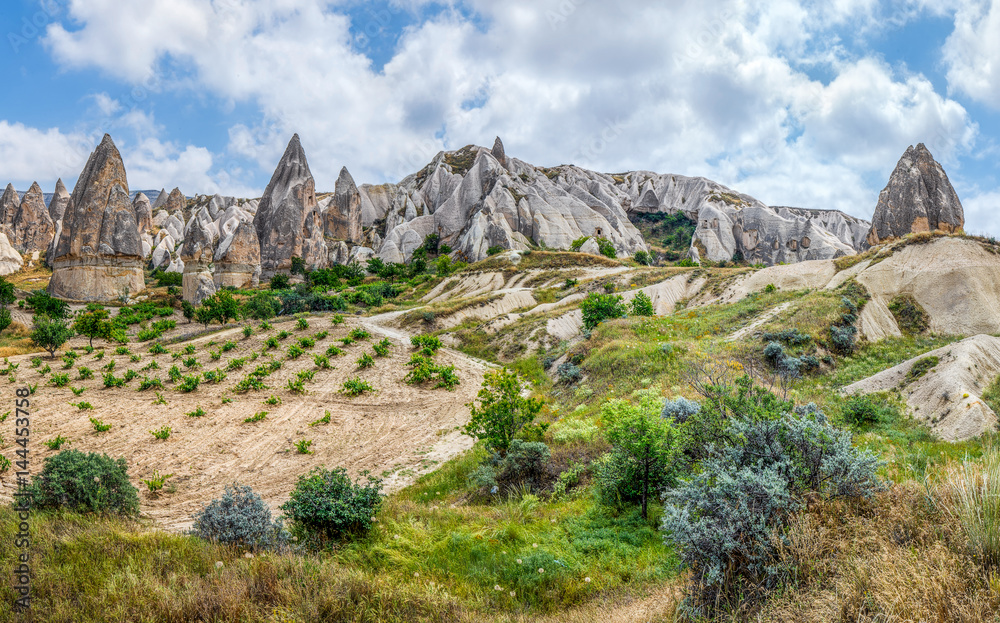 Panorama of a geological formation consisting of volcanic tuff with ...