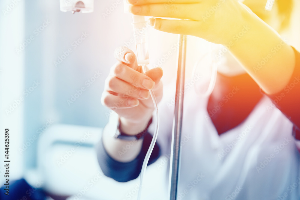 nurse sets the patient's dropper, the concept of restoring health ...