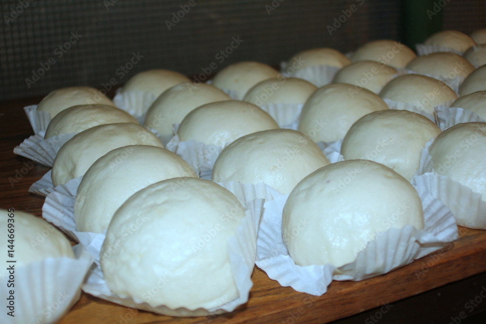 Siopao (steamed buns) Siopao, or steamed buns is a famous snack sold ...