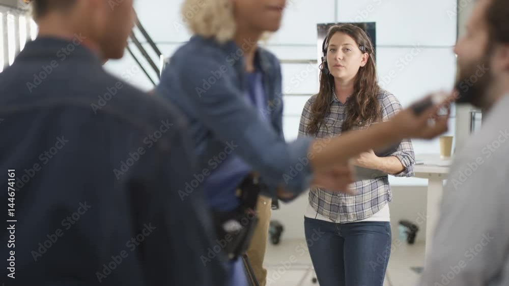 TV crew in studio, preparing to go live on air Stock Video | Adobe Stock