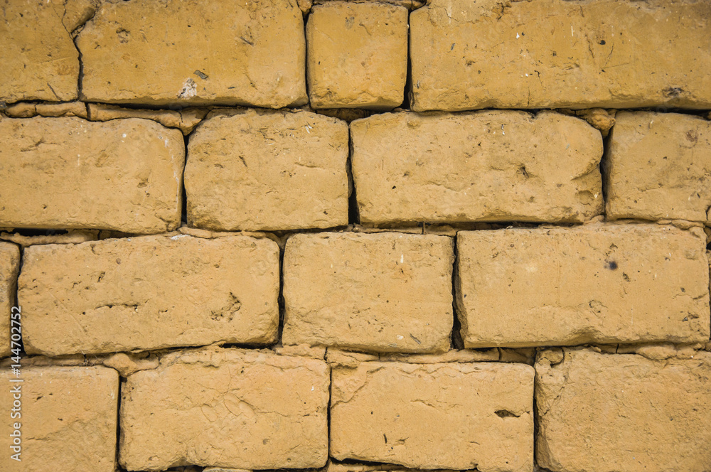 Mud brick wall background and texture Stock Photo | Adobe Stock