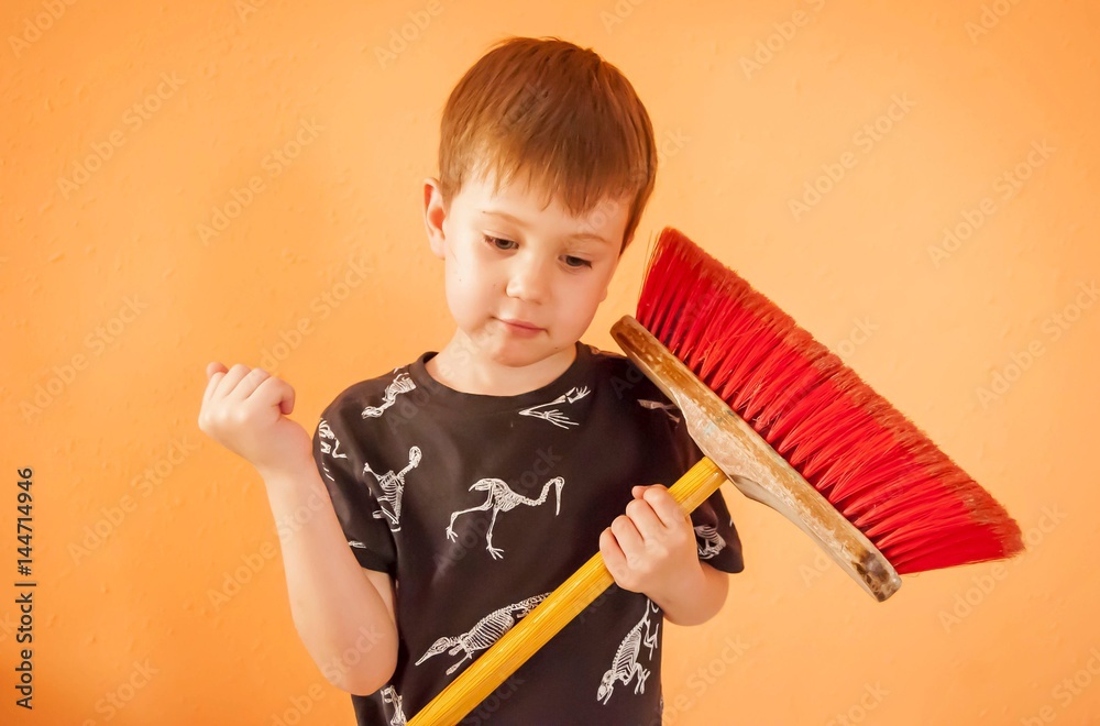 Pretty Caucasian child with a broom, house chores stock image. Mother's ...