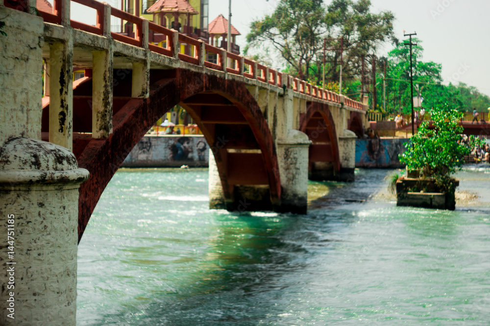Bridge spanning across the river Ganga in Haridwar. These old bridges ...