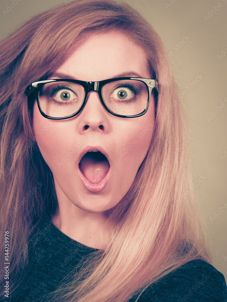 Woman in eyeglasses having shocked face expression Stock Photo | Adobe ...