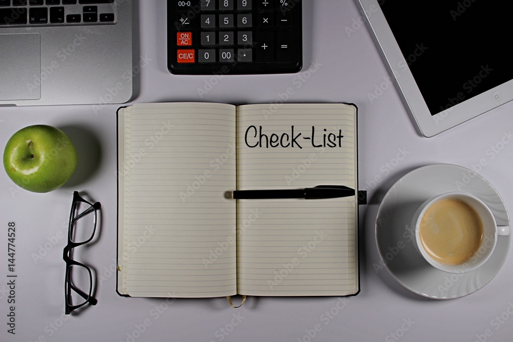 Word check list written on notebook Stock Photo | Adobe Stock