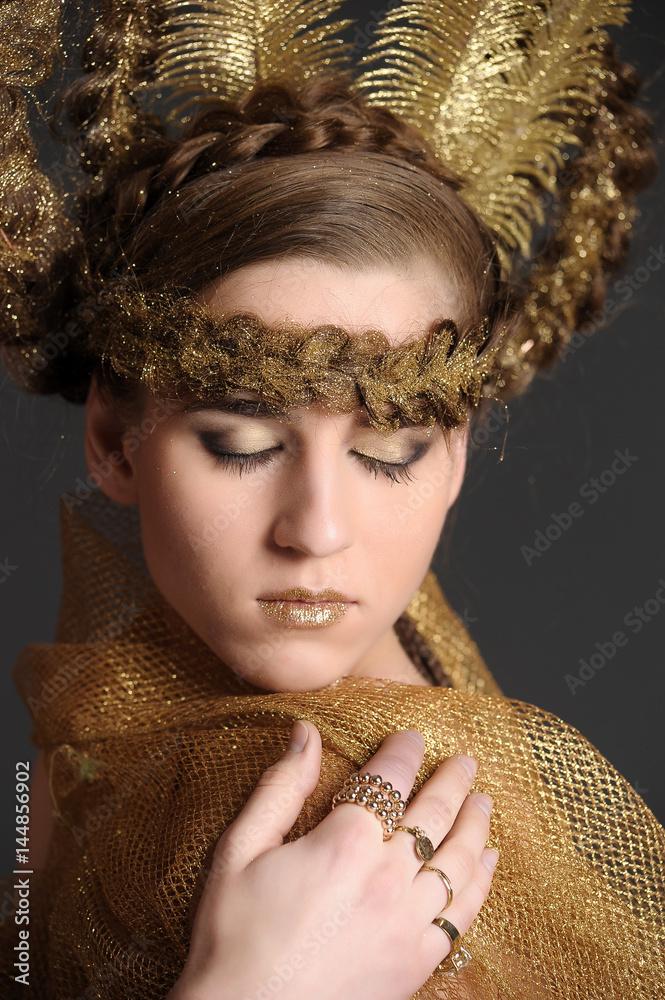Golden lady Stock Photo | Adobe Stock
