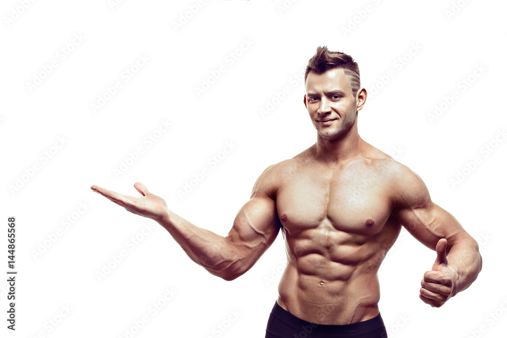 Young handsome and shirtless male with strong body posing and gesturing ...