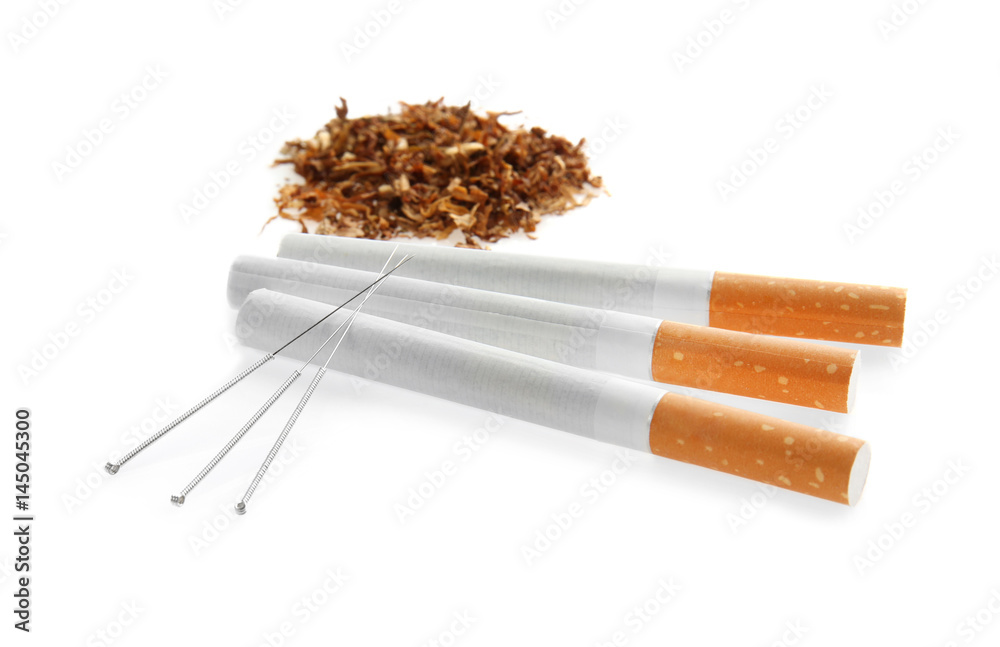 Cigarettes with needles and tobacco on white background Stock Photo ...