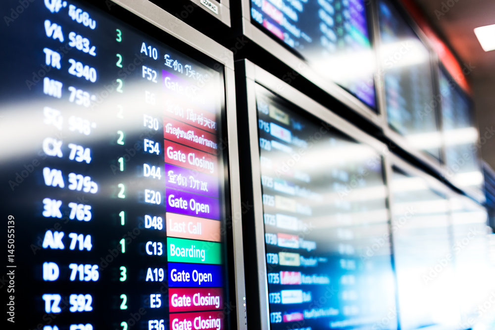 screen with flight information in airport Stock Photo | Adobe Stock