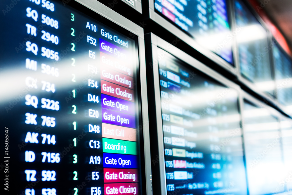 screen with flight information in airport Stock Photo | Adobe Stock