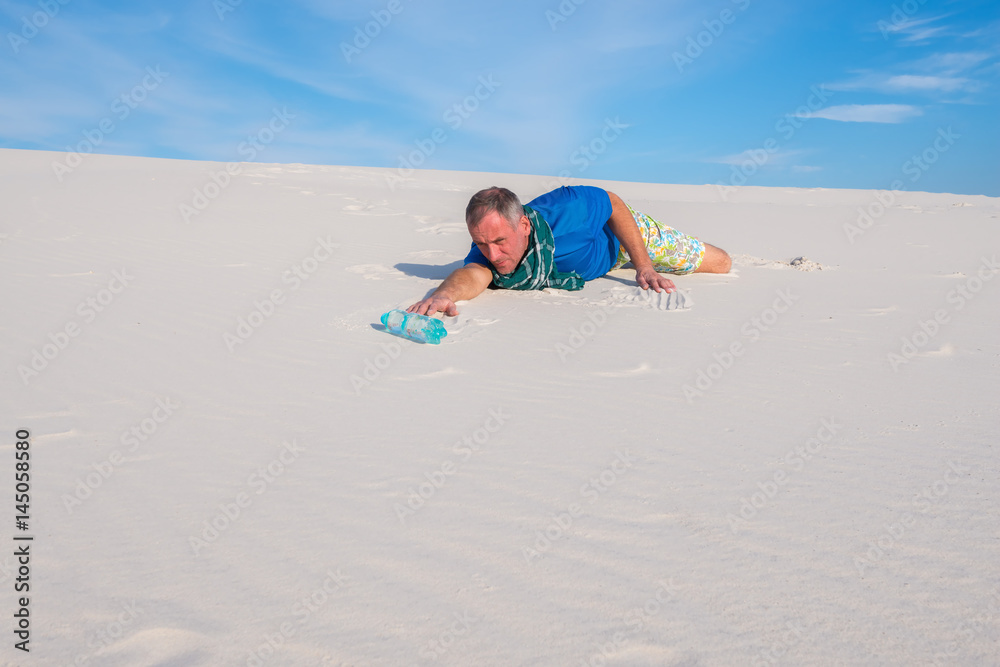 Traveler suffering from thirst, is crawling through the desert Stock ...