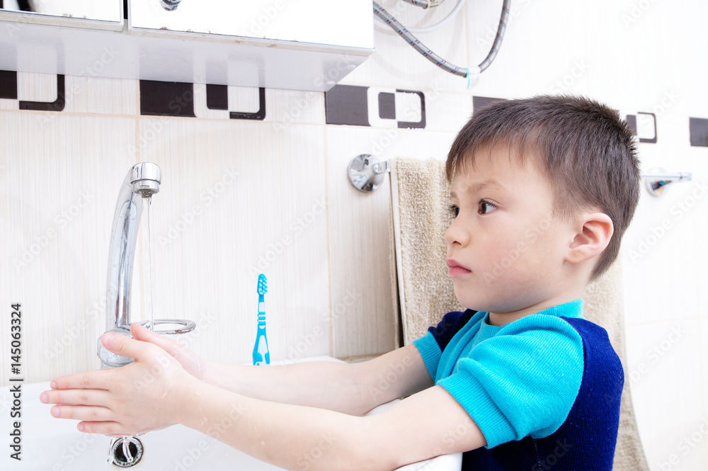 Boy washing hands, child personal health care, hygiene concept, kid ...
