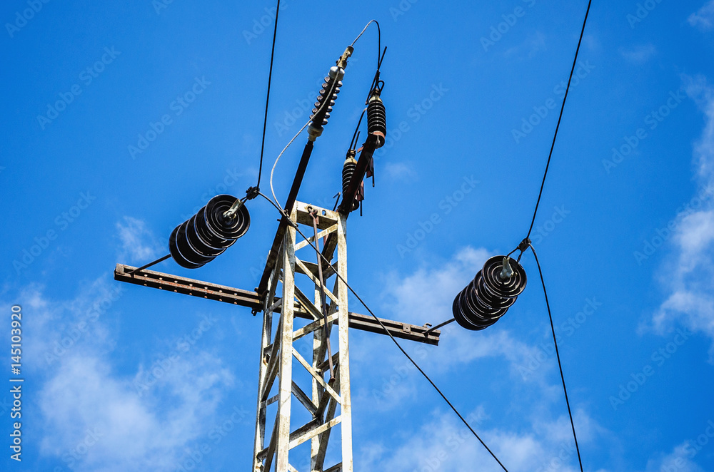 Railroad overhead lines against clear blue sky, Contact wire. High ...