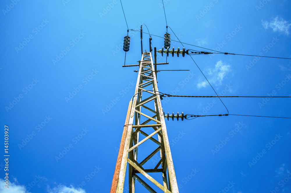 Railroad overhead lines against clear blue sky, Contact wire. High ...