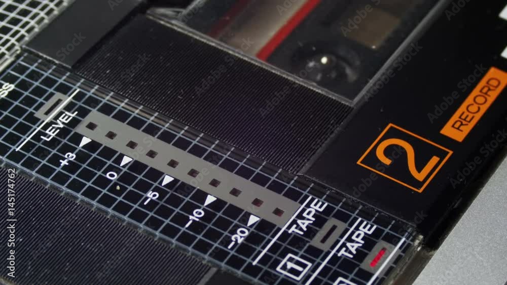 Playing an Audio Cassette in a Vintage Tape Recorder. Close-up. Black ...
