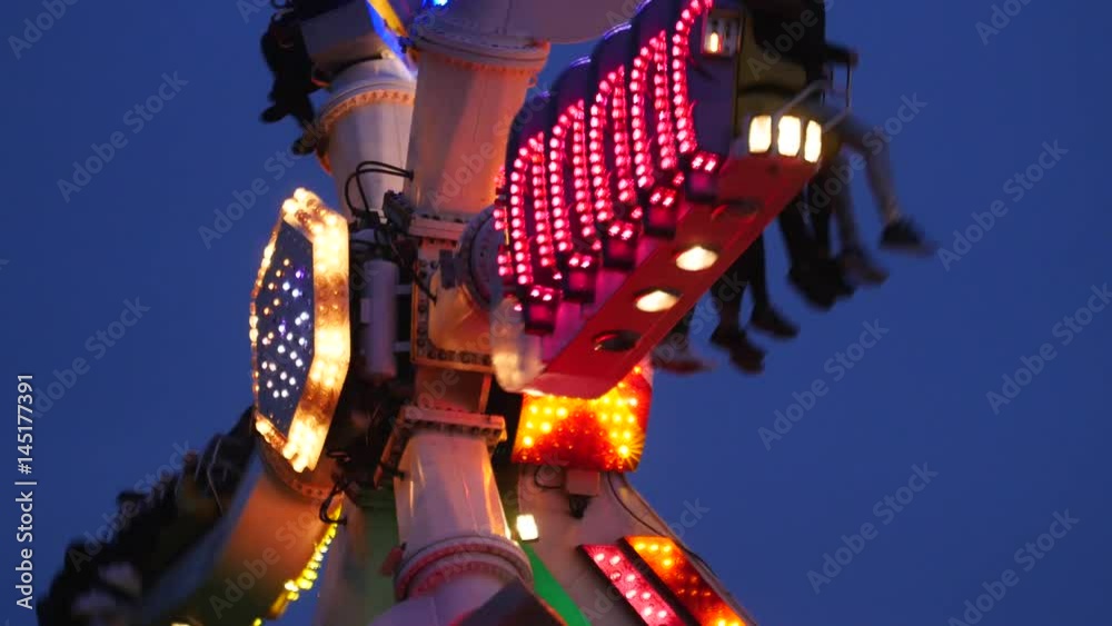 Spinning Fun Fair / Carnival Ride, Light up Against Night Sky Stock ...