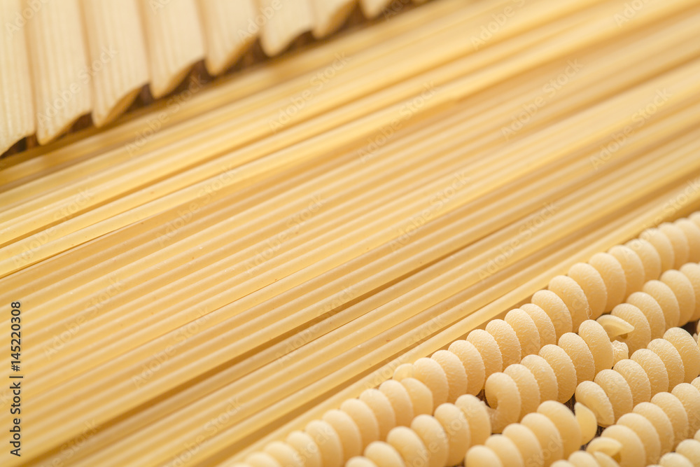 Variety of types and shapes of dry Italian pasta. Italian Macaroni raw ...