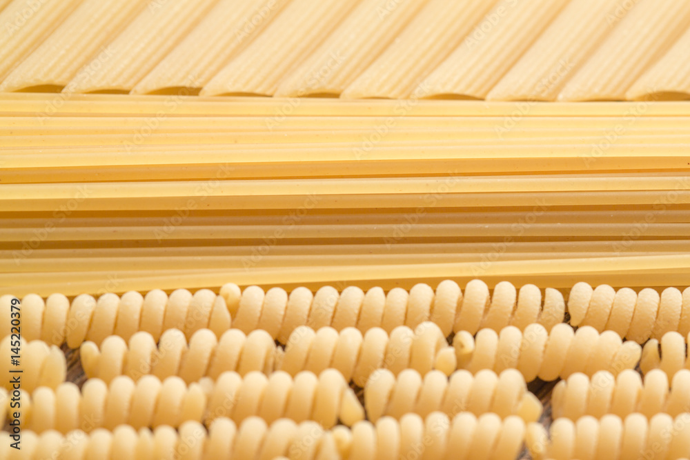 Variety of types and shapes of dry Italian pasta. Italian Macaroni raw ...