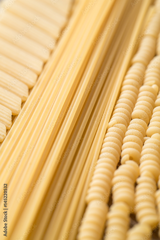 Variety of types and shapes of dry Italian pasta. Italian Macaroni raw ...