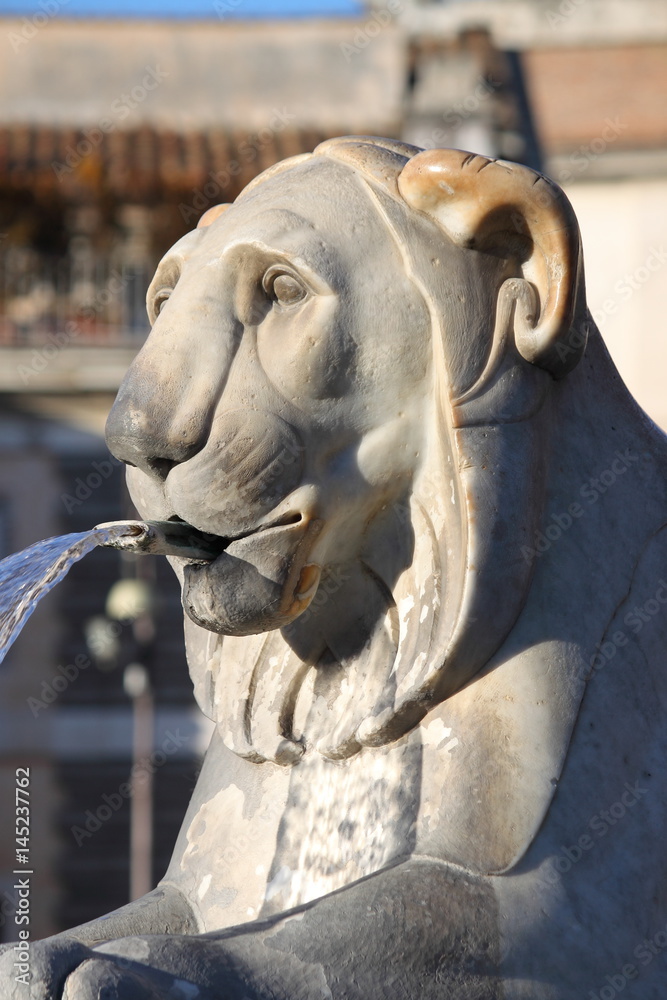 Lion statue spitting water in Rome, Italy Stock Photo | Adobe Stock