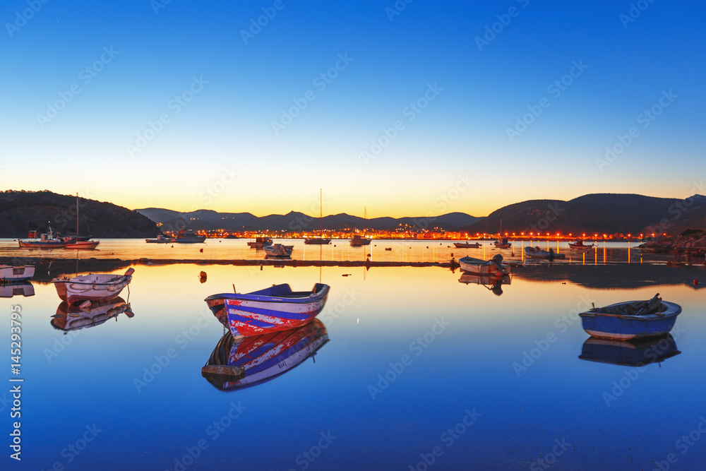 Moored fishing boats in greek bay at Aegean sea, sunset scenery ...