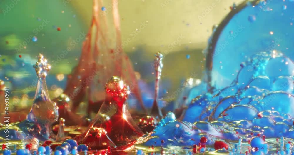 Stars wars of the planet.Color drops floating in oil and water over a ...