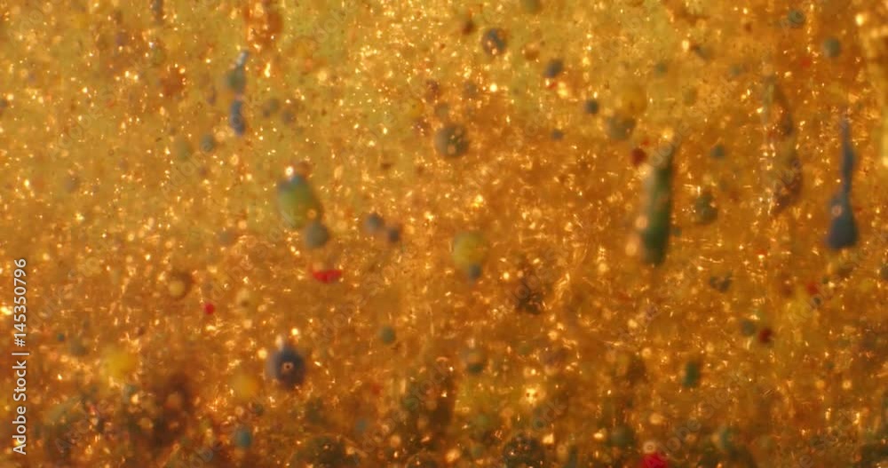 Stars wars of the planet.Color drops floating in oil and water over a ...