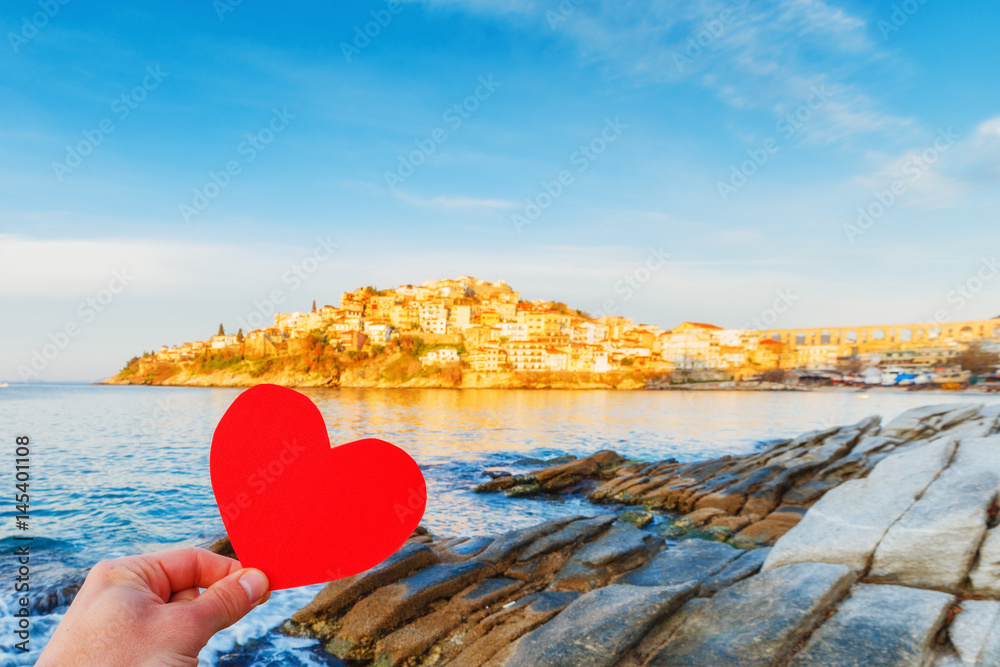 I Love Greece Concept Person Keep Paper Red Heart In Hand At Greek i-love-greece-concept-person-keep-paper-red-heart-in-hand-at-greek