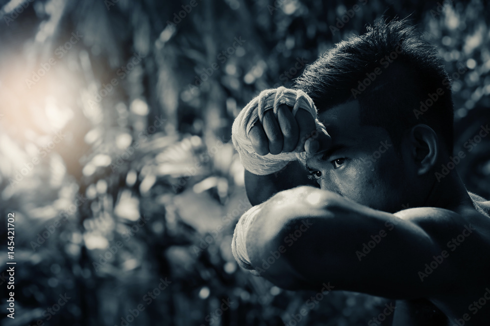 Muay Thai / Muay Kaad Chuek / Bare Knuckle Fighting.Thai boxer with ...