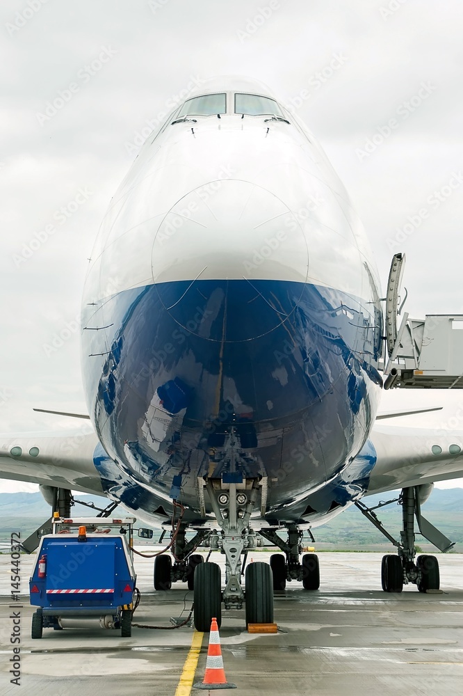 Close view of the cockpit, front landing gear and the front part of ...