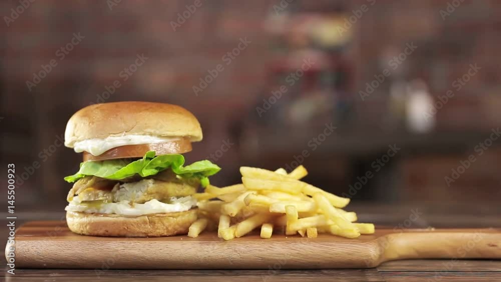 Burger Build Up - Fish Fillet Burger Stock Video | Adobe Stock