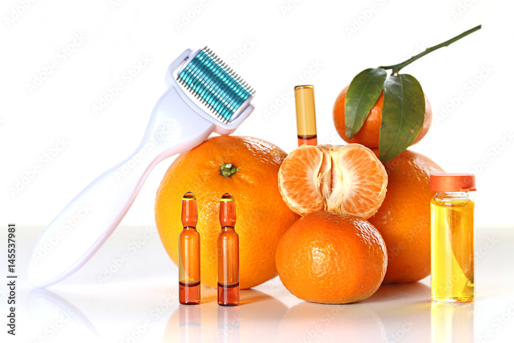 Mesotherapy of face and body. Massage roll, mandarin essential oil ...