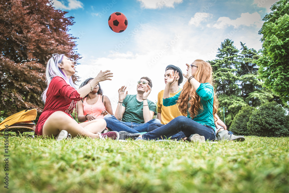 Group of young people in a park Stock-Foto | Adobe Stock
