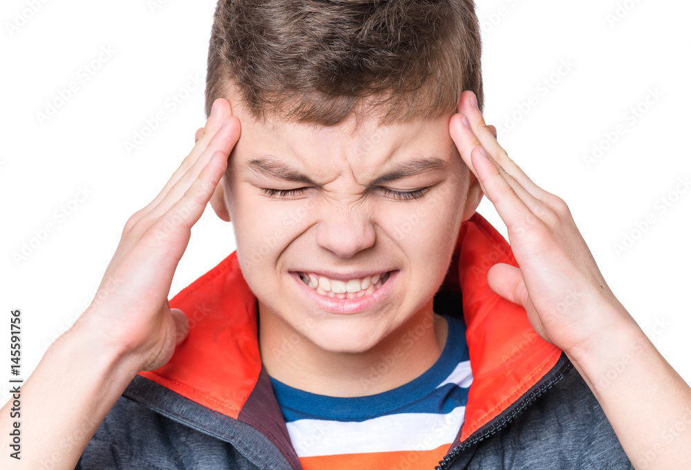 Stress and headache - teen boy having migraine pain. Handsome child ...