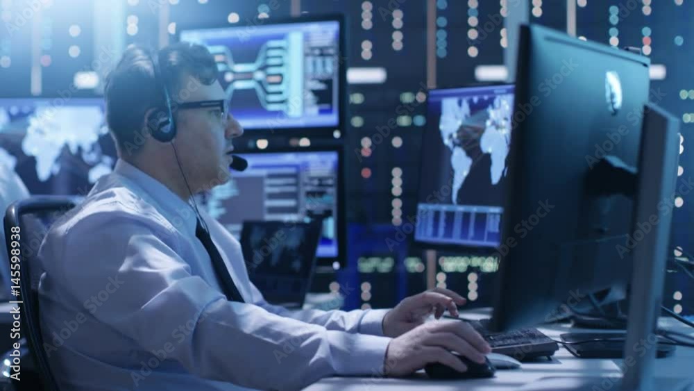 Professional Technical Support Personnel Working in a System Control ...