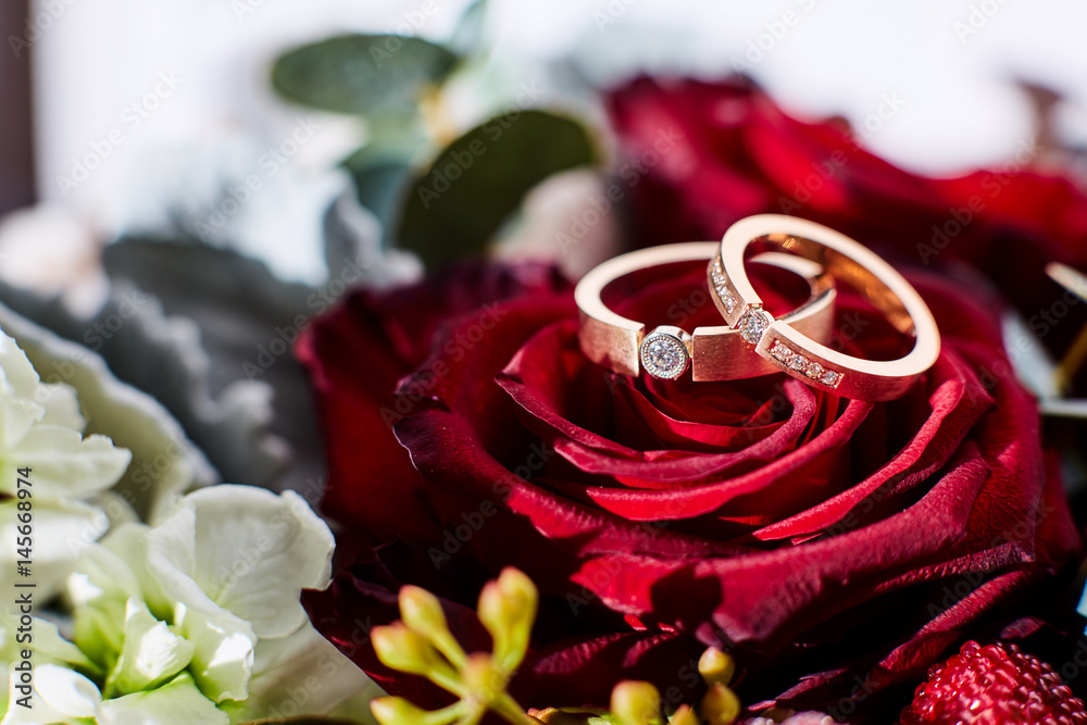 wedding rings. background rings with flowers Stock Photo | Adobe Stock