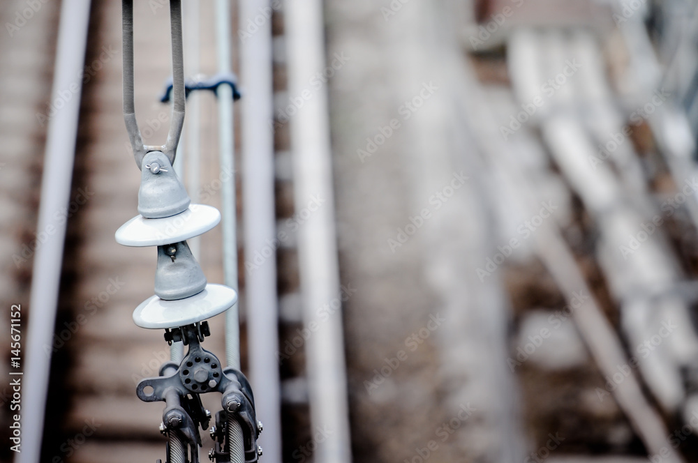 Railroad tracks with railway electrification system. Overhead line wire ...
