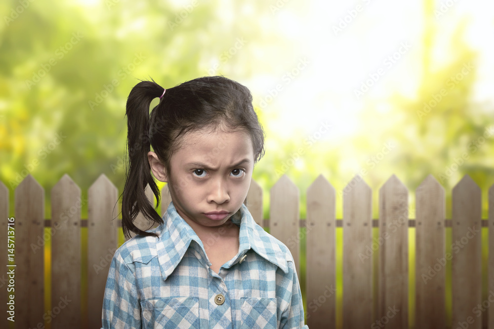 Sad asian kid in blue clothes with disbelief expression Stock-Foto ...