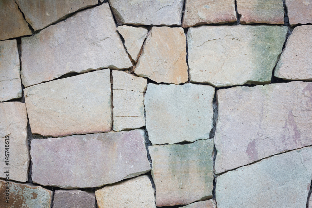 Multi-colored and multi-sized, pale rocks wall grunge texture ...